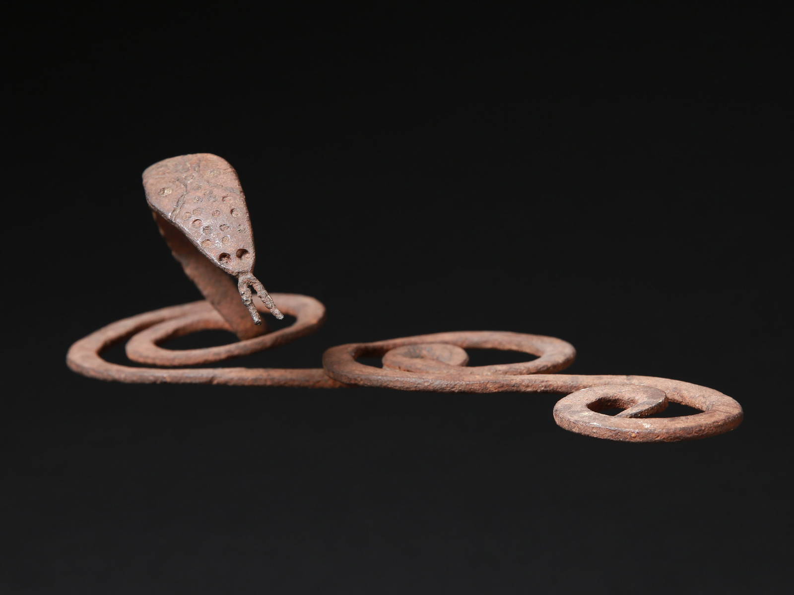 A Lobi Iron Snake Auction
