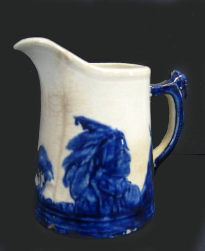 Two Sleepy Eye Pottery Pitchers.