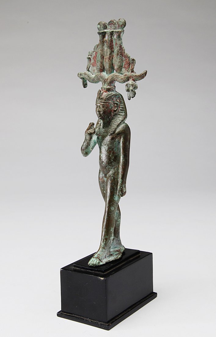 An Egyptian Bronze Figure of Harpocrates