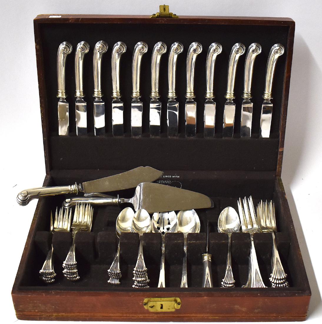 Tuttle Sterling Silver Flatware Service. (54 pcs)