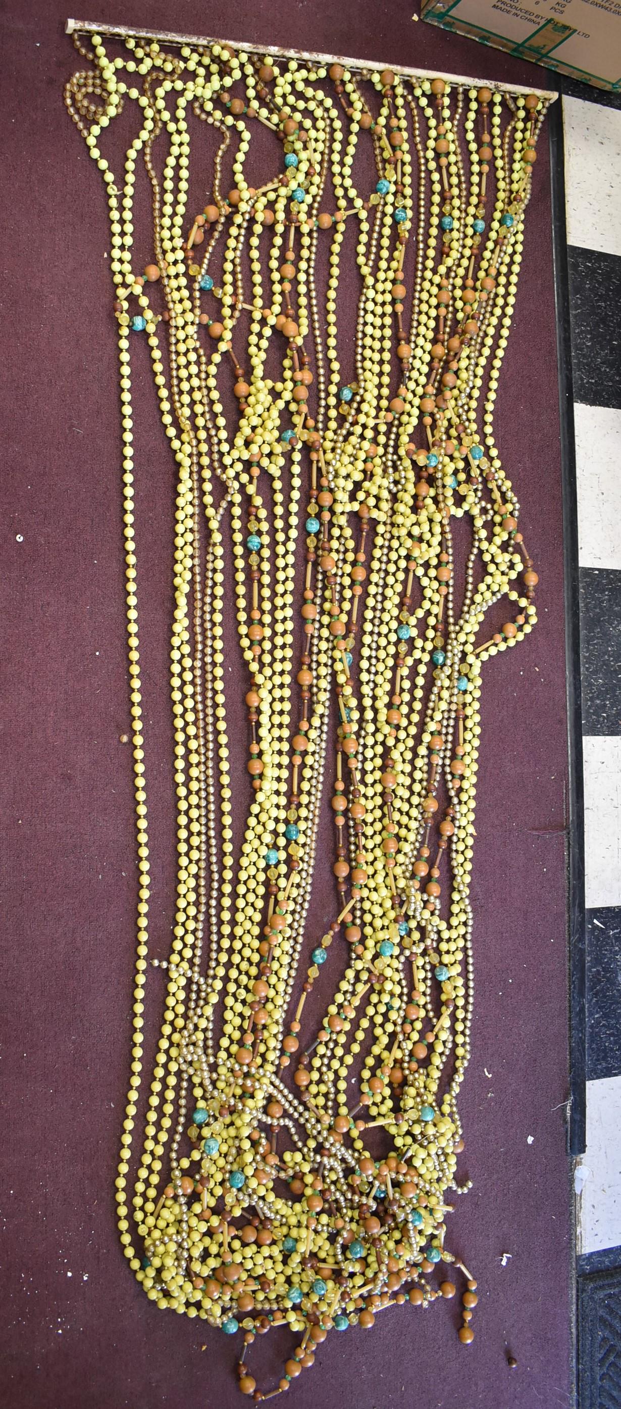 Beaded Screen Backdrop Used In Yeager Photoshoots