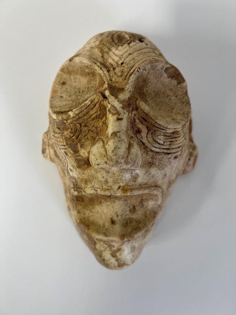 Expressive Stone Taino Human Head . Auction