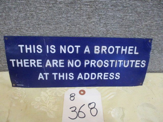 Stamped Tin Brothel Sign