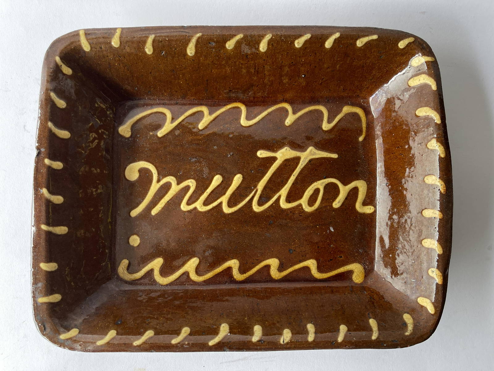 Mutton Redware Glazed Load Dish With Slip Decoration Auction
