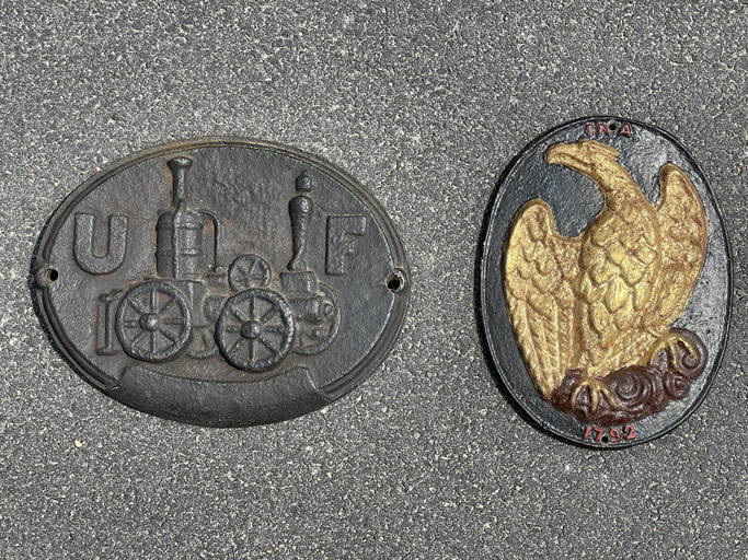 Two Cast Iron House Fire Markers