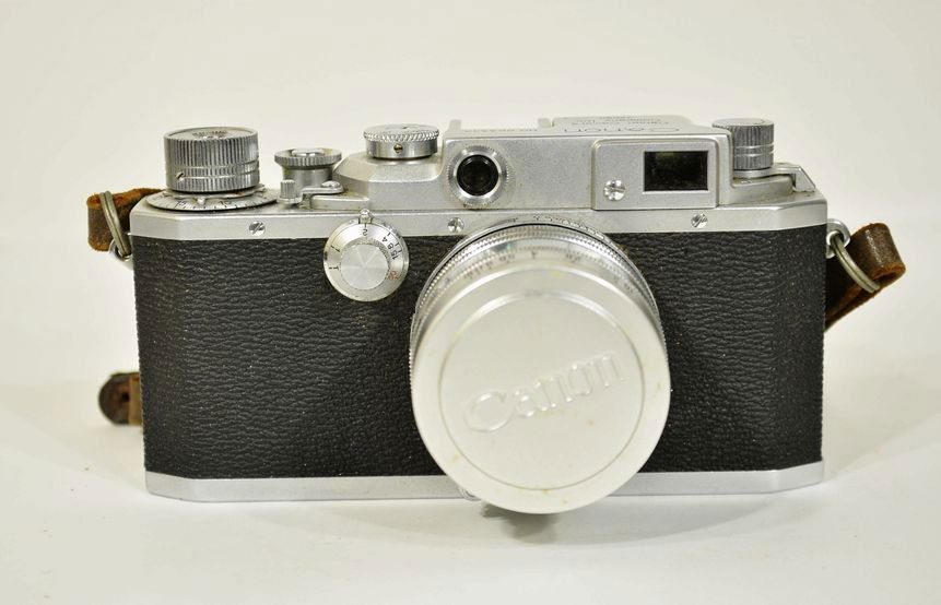 Vintage Canon Camera With Lens