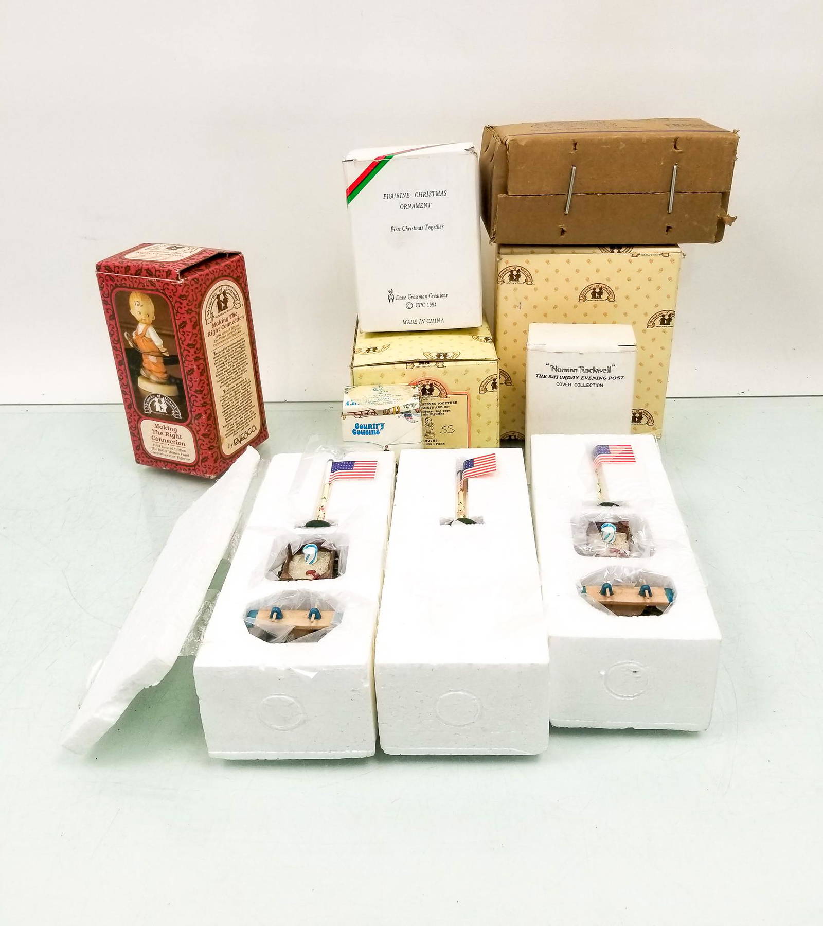 Assorted Collectible Figurines In Box Auction