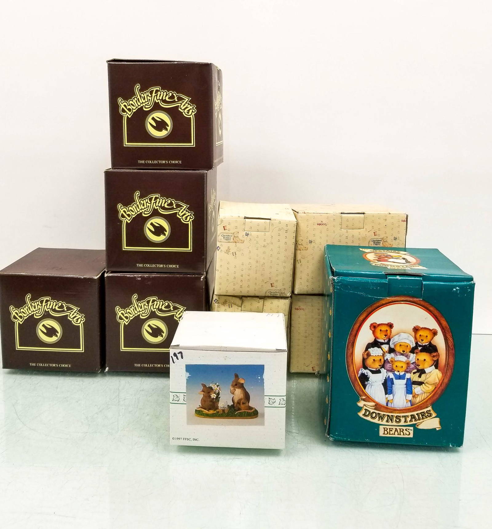 Assorted Collectible Figurines In Box Auction