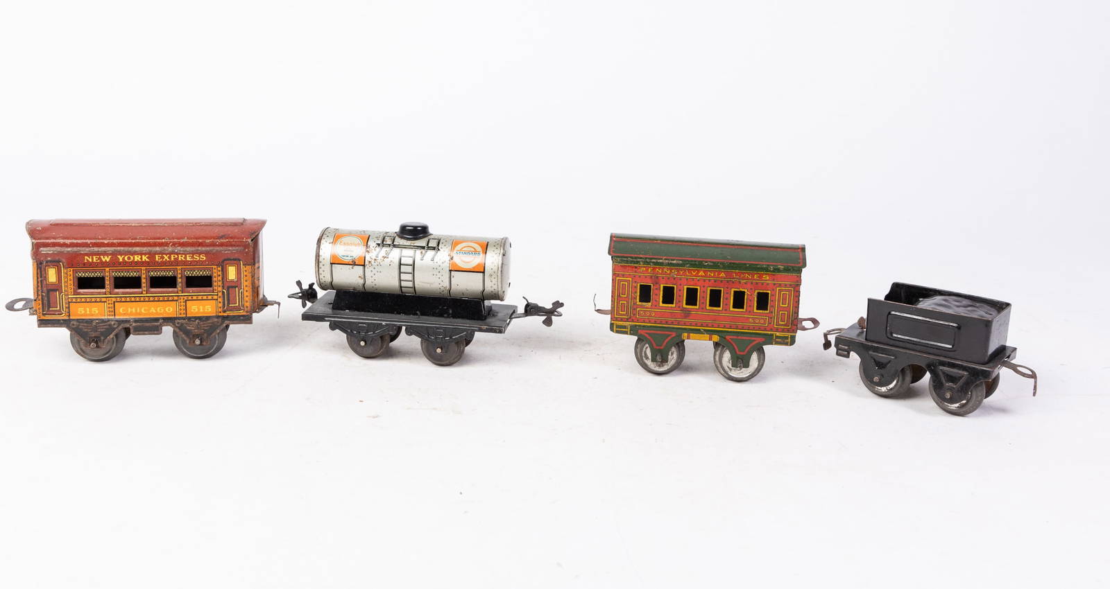 Four Assorted Vintage Tin Model Trains Auction