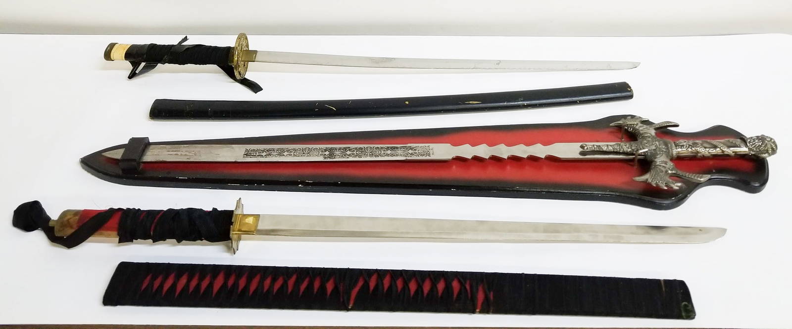 Three Replica Prop Swords Auction