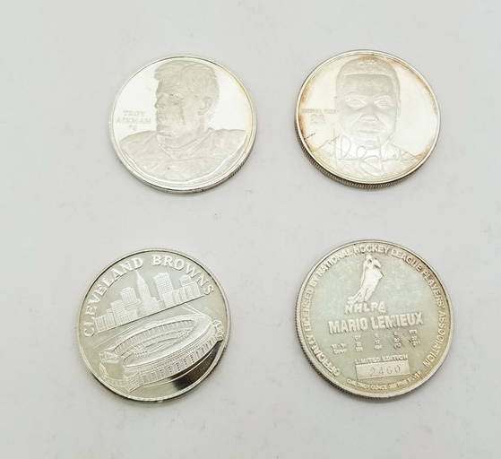 Four Ounces Of .999 Silver Sports Rounds