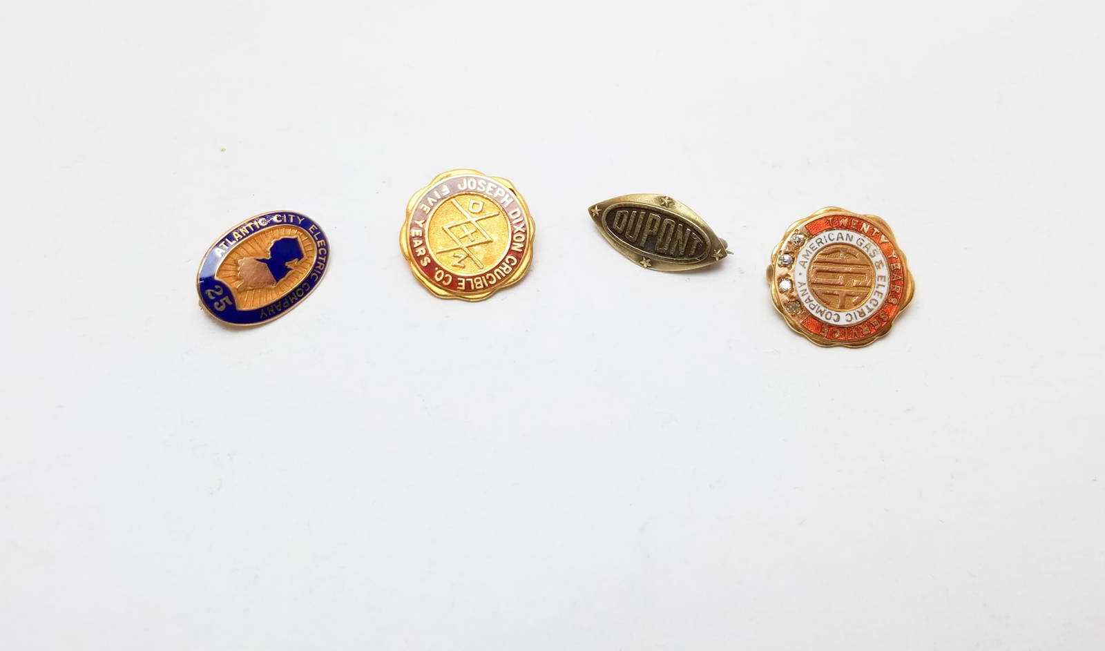 Assorted Gold Pins Auction