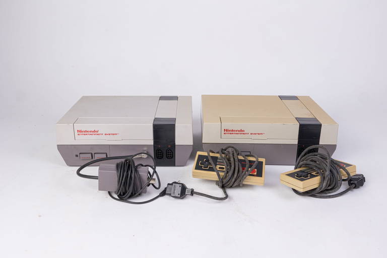 Two Nintendo Entertainment System Nes Consoles With Accessories