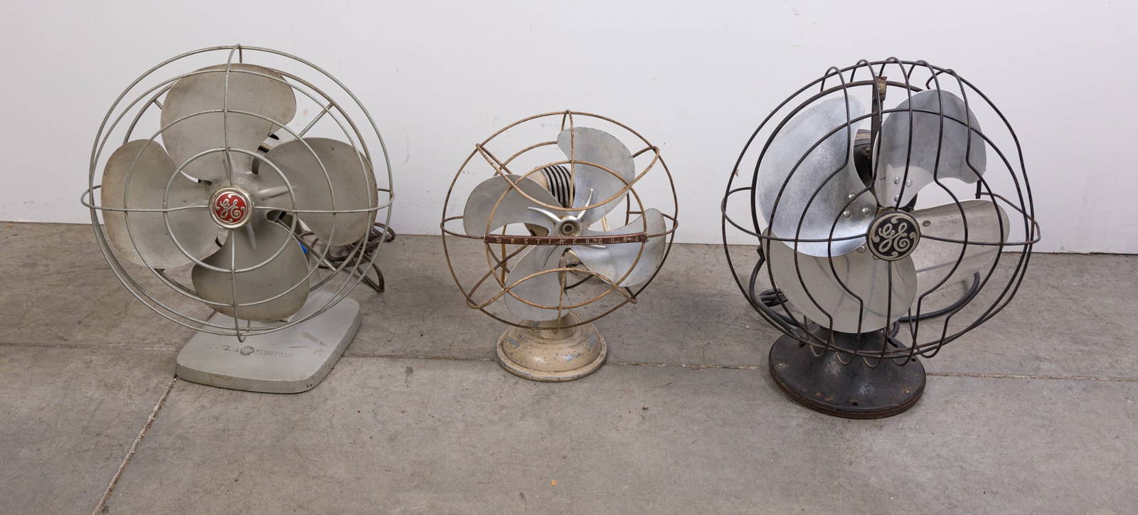 Three Vintage Electric Fans Auction