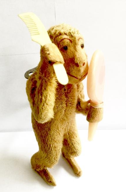 Monkey Combing Hair Wind Up Toy
