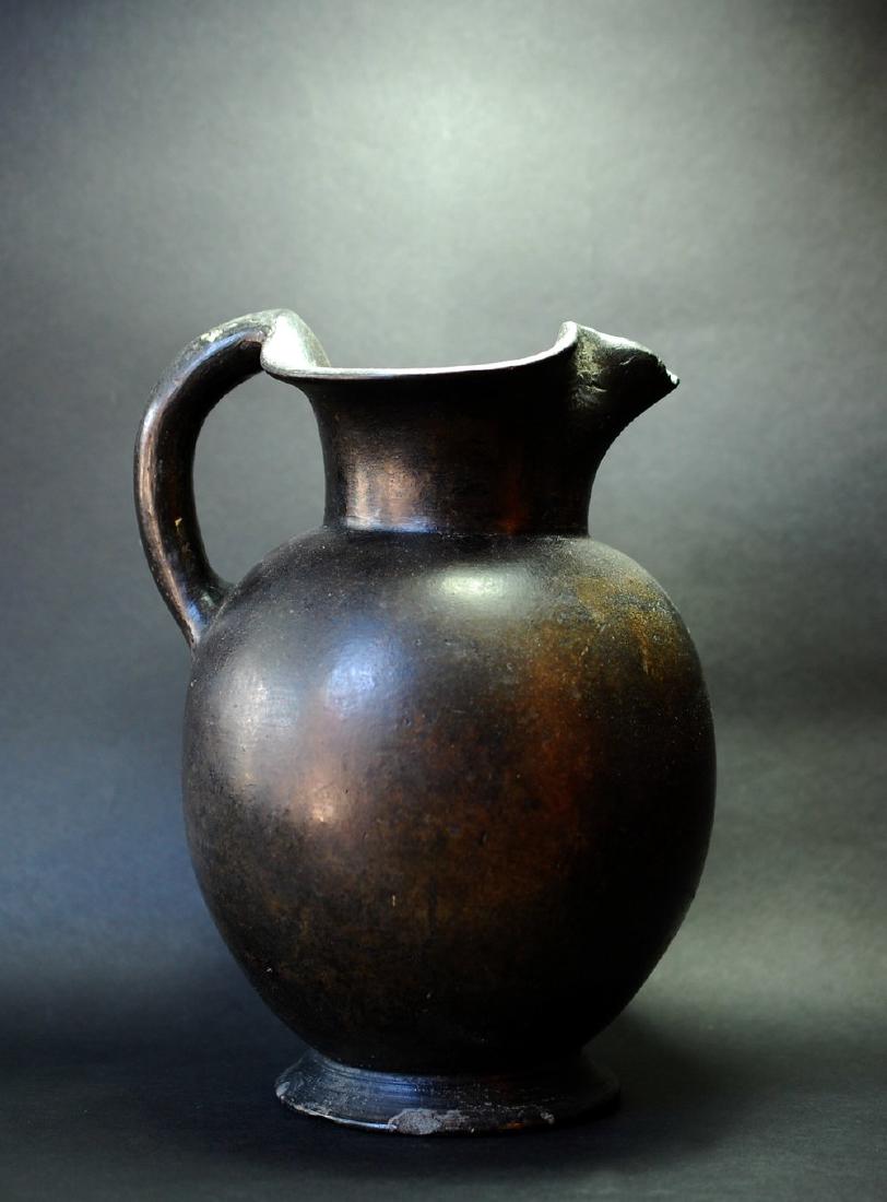 BUCCHERO NERO OINOCHOE, ETRURIA, 7TH CENTURY B.C.