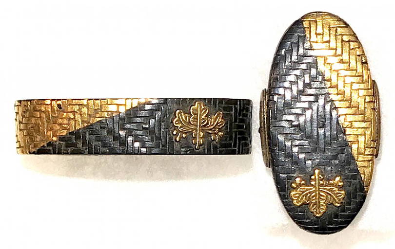 Fuchi Kashira Of Gold And Shakudo With A Kiri Mon