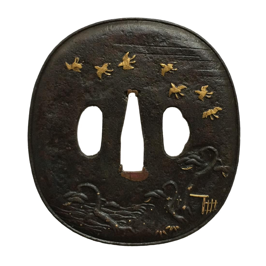 Iron tsuba by Aizu Shoami school, carved and inlaid