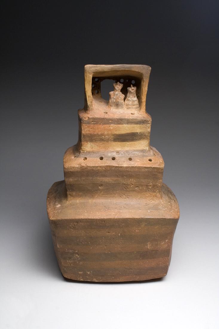 Archaic vessel representing a large pyramid structure