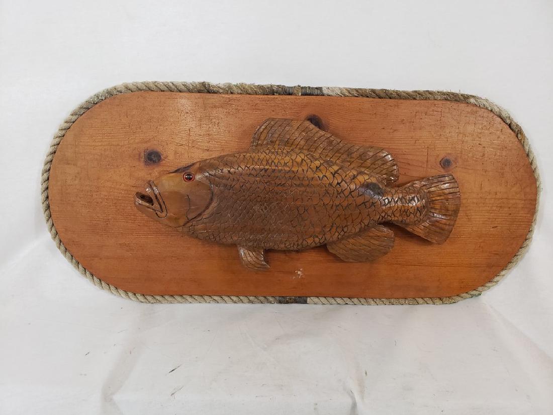 Carved bass plaque with rope trim ca 1940's