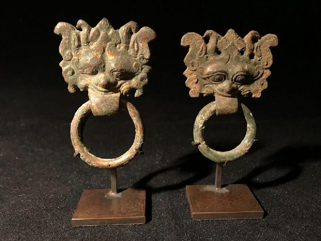 Two Han Dynasty Bronze Taotie Masks