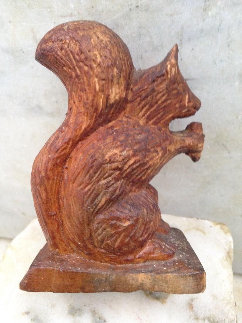 Folk art carved wooden squirrel