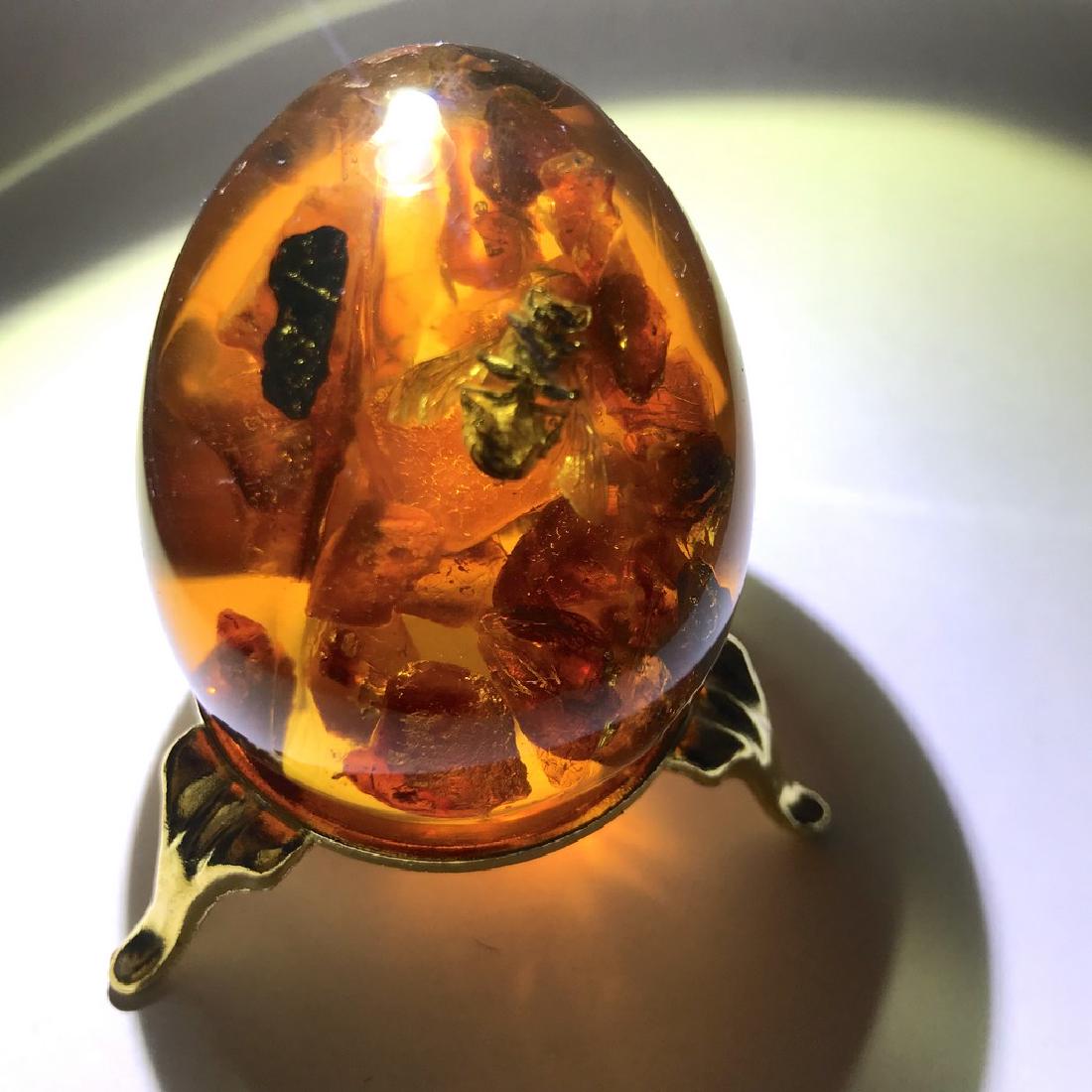 Baltic Amber egg with bee insect inclusion