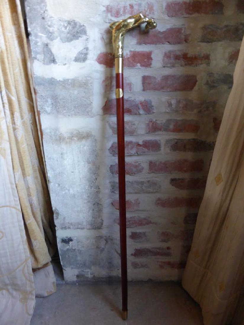 Cane with erotic bronze handle (bending lady)