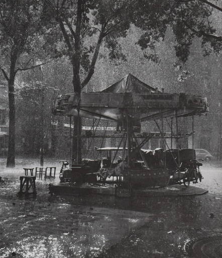 Robert Doisneau Carousel In The Rain
