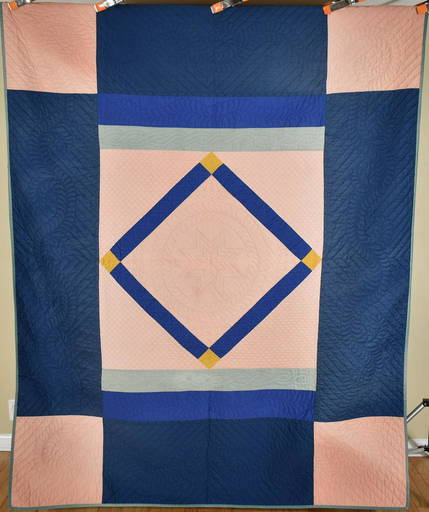 Well Quilted Amish Diamond In A Square Quilt