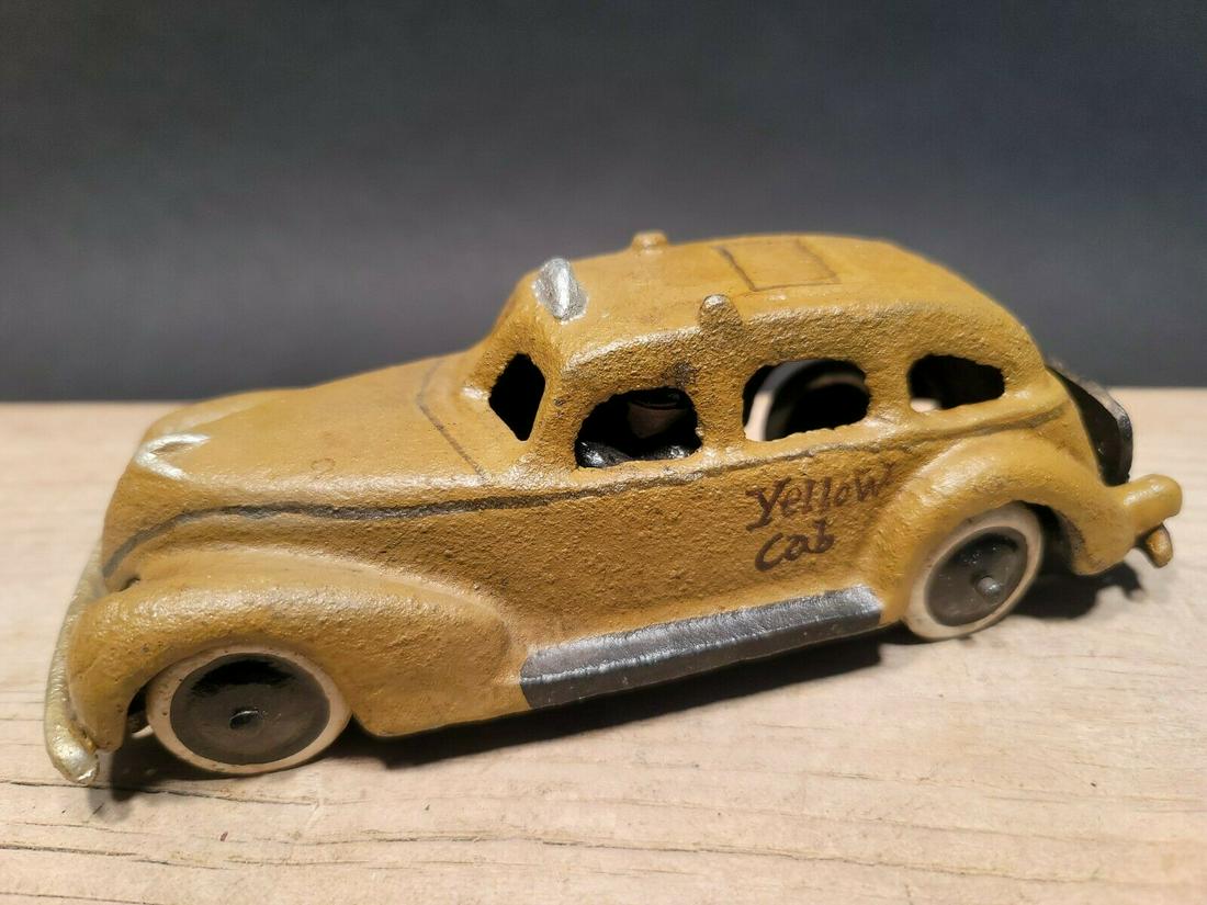 Cast Iron Yellow Cab Toy Car
