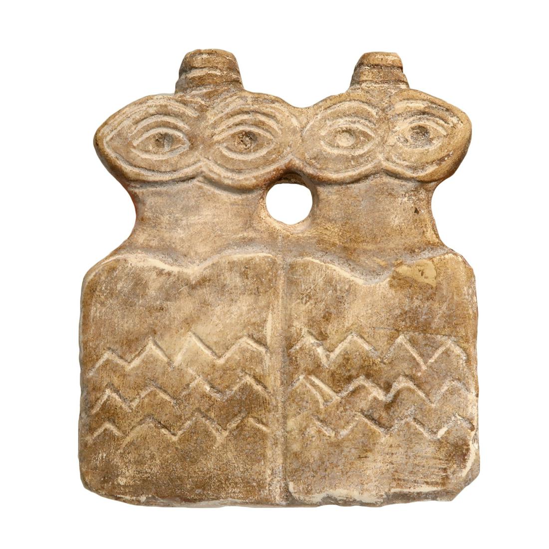 A Mesopotamian Marble Double 'eye' Idol