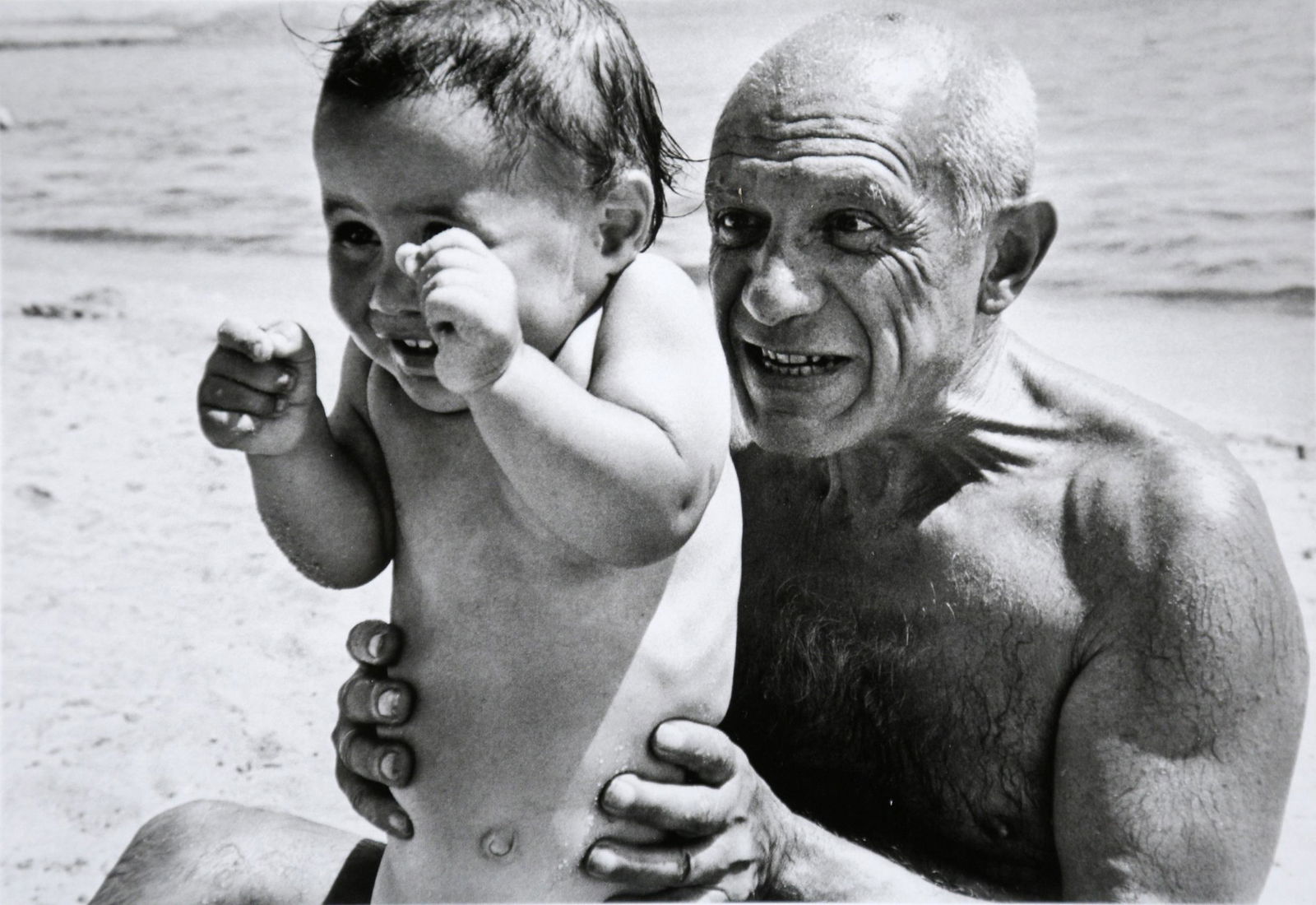 Robert Capa: Pablo Picasso With His Son Claude. Golfe Juan, 1951
