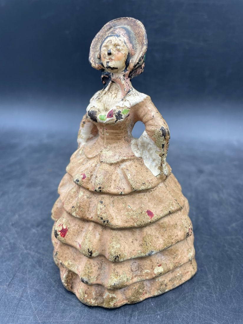Cast Iron Victorian Lady With Bonnet And Pink Frilly Dress Auction