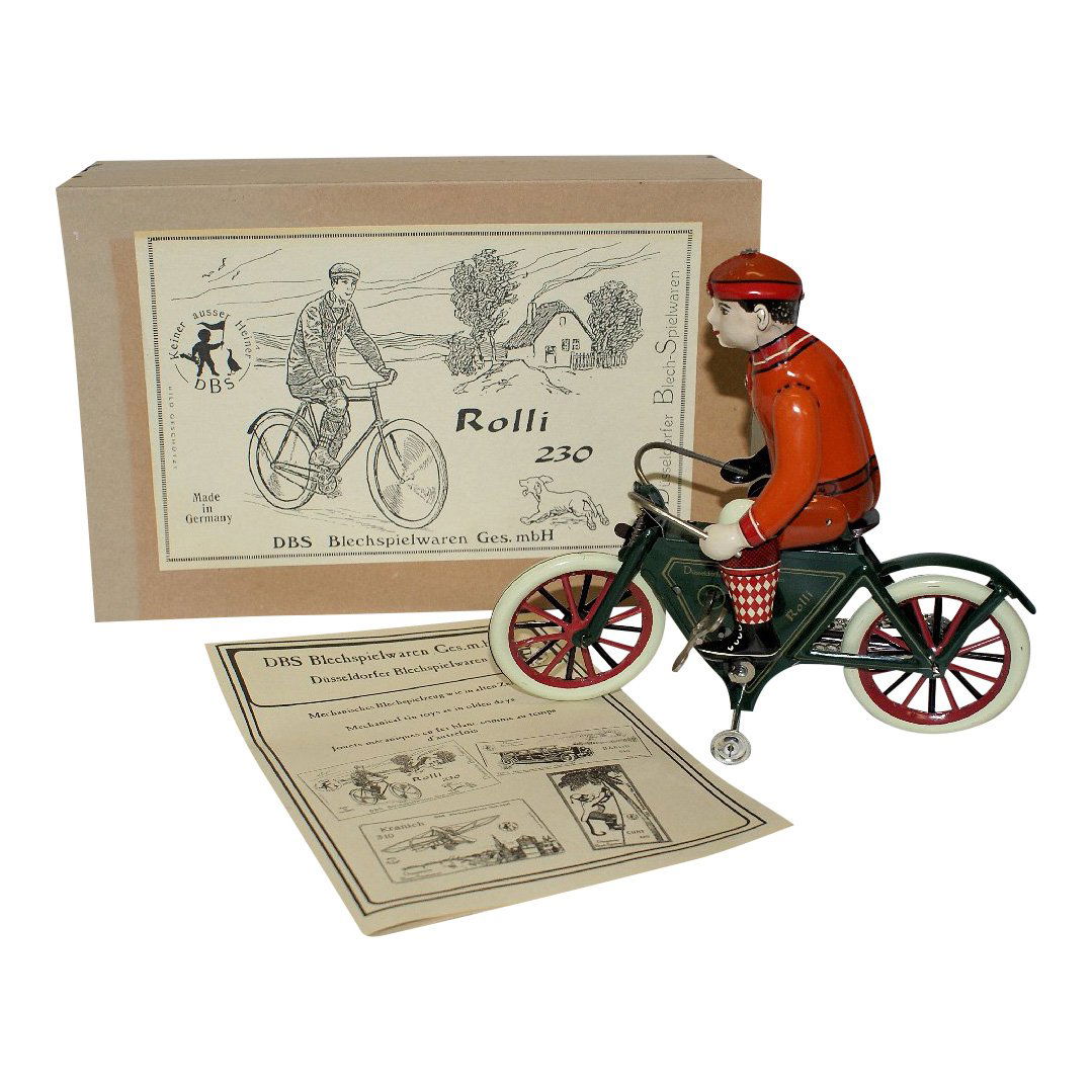 Rolli 230 Tin Wind Up Bicycle With Rider Figure