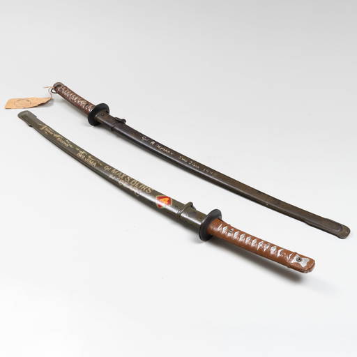 Two Japanese Painted Metal Katana Trophies Commemorating Iwo Jima
