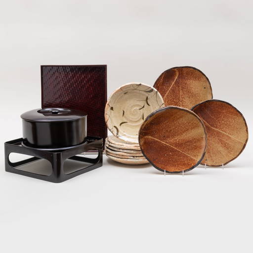 Set Of Four Pascal Cholmar Pottery Plates And A Set Of Seven Pottery Plates