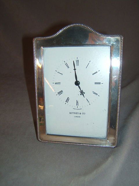 9383: KITNEY & CO. STERLING FRAME CLOCK