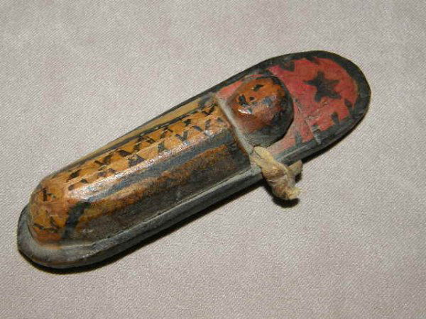 1033: CARVED WOOD PAPOOSE DESIGN ITEMS