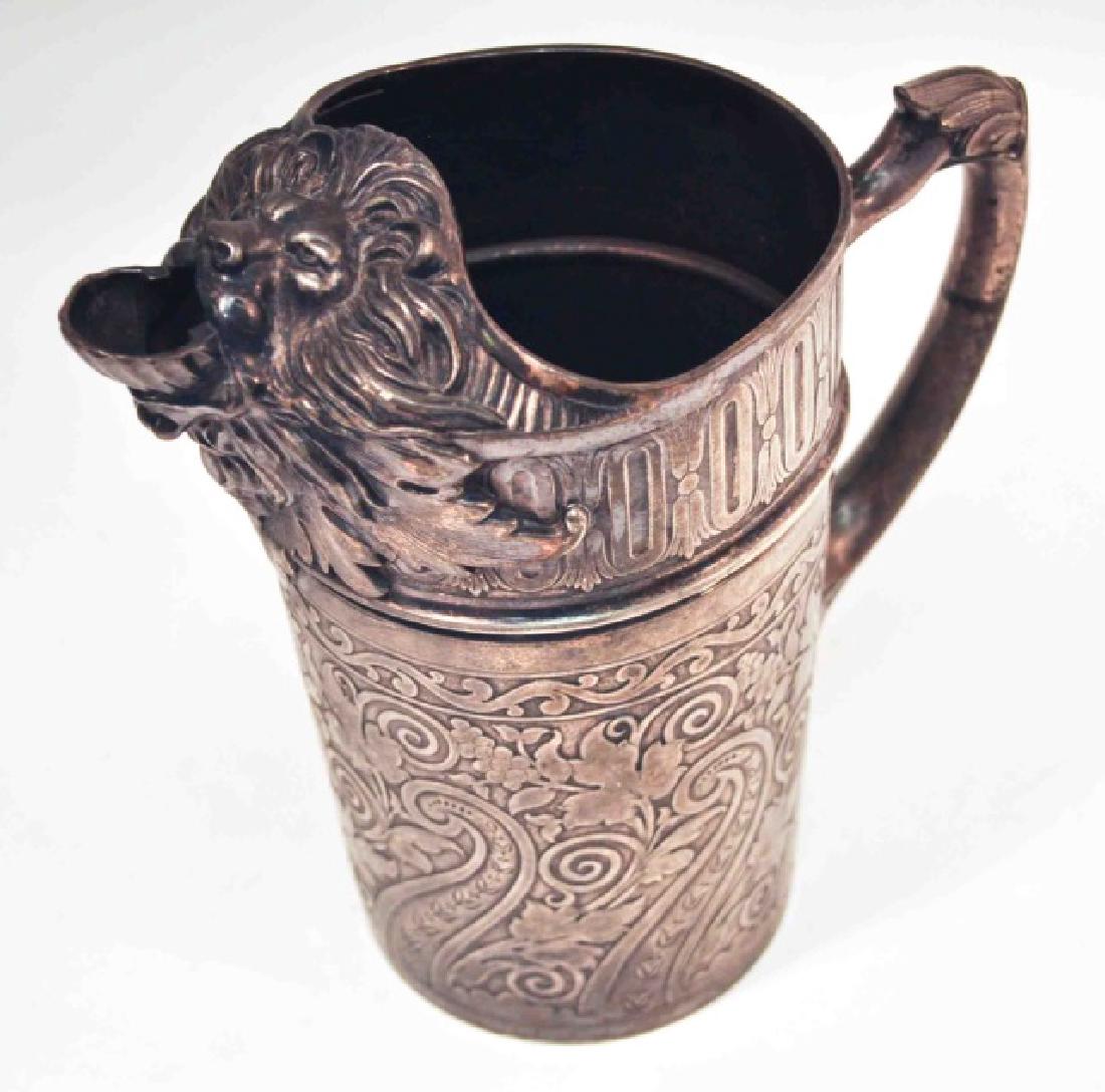 Impressive James W. Tufts Lion Head Pitcher