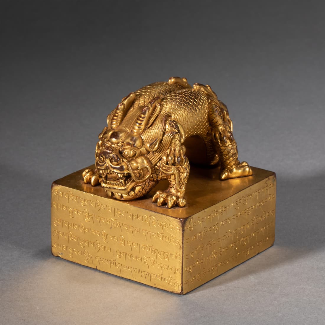 A Tibetan Bronze-gilt Mythical Beast Seal Auction