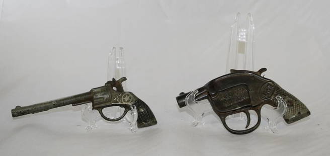 Two Cast Iron Animated Cap Guns