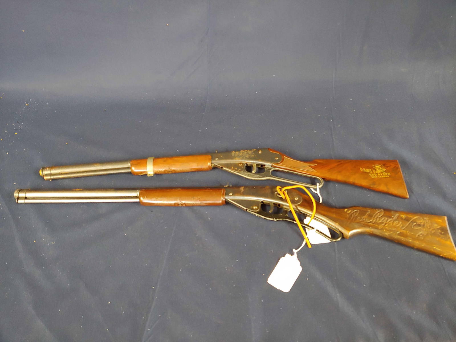Pair Of Daisy Red Ryder Bb Guns Auction