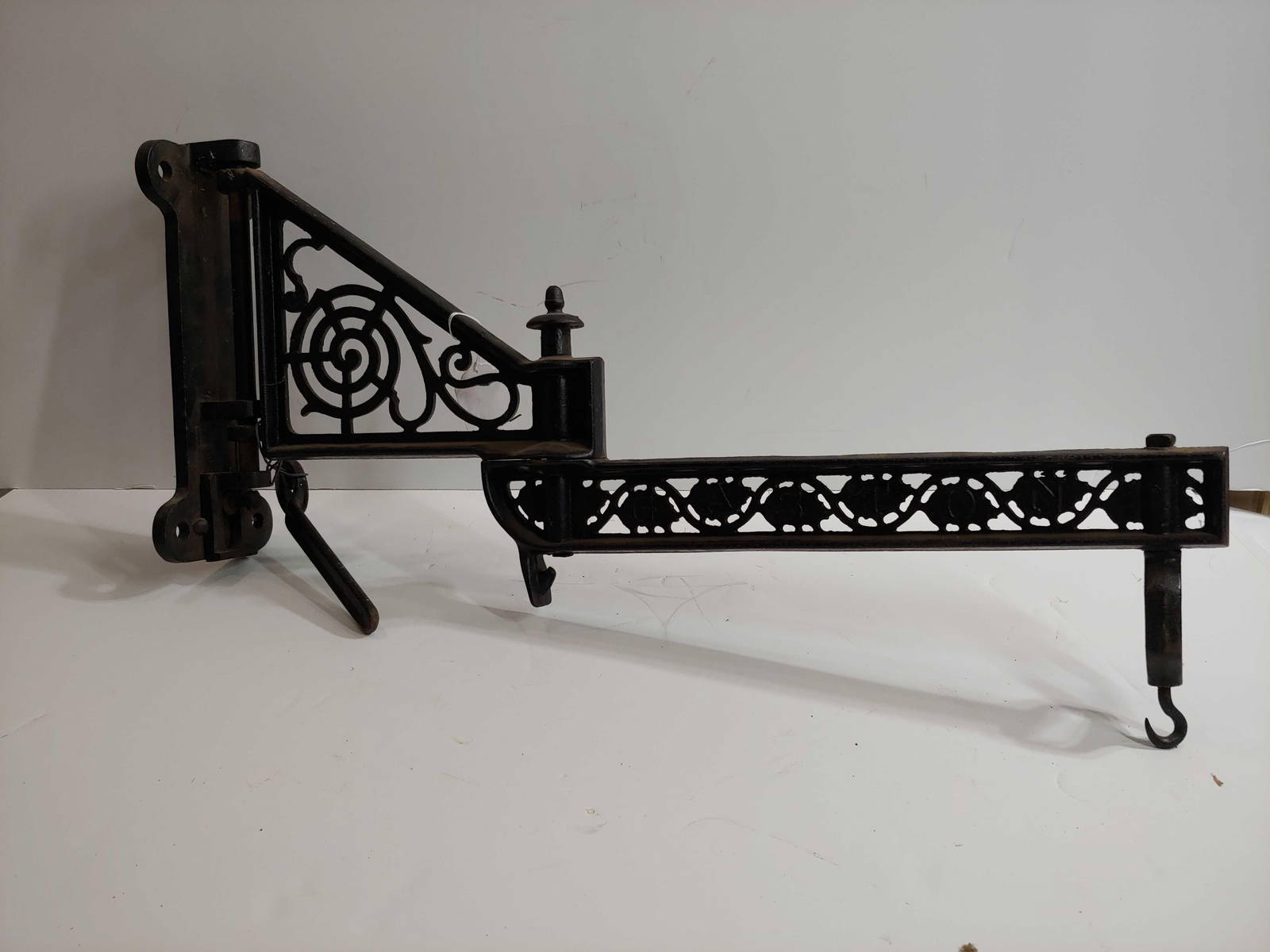 Awesome Ornate Cast Iron Gaston Wall Mount Sign Bracket Auction