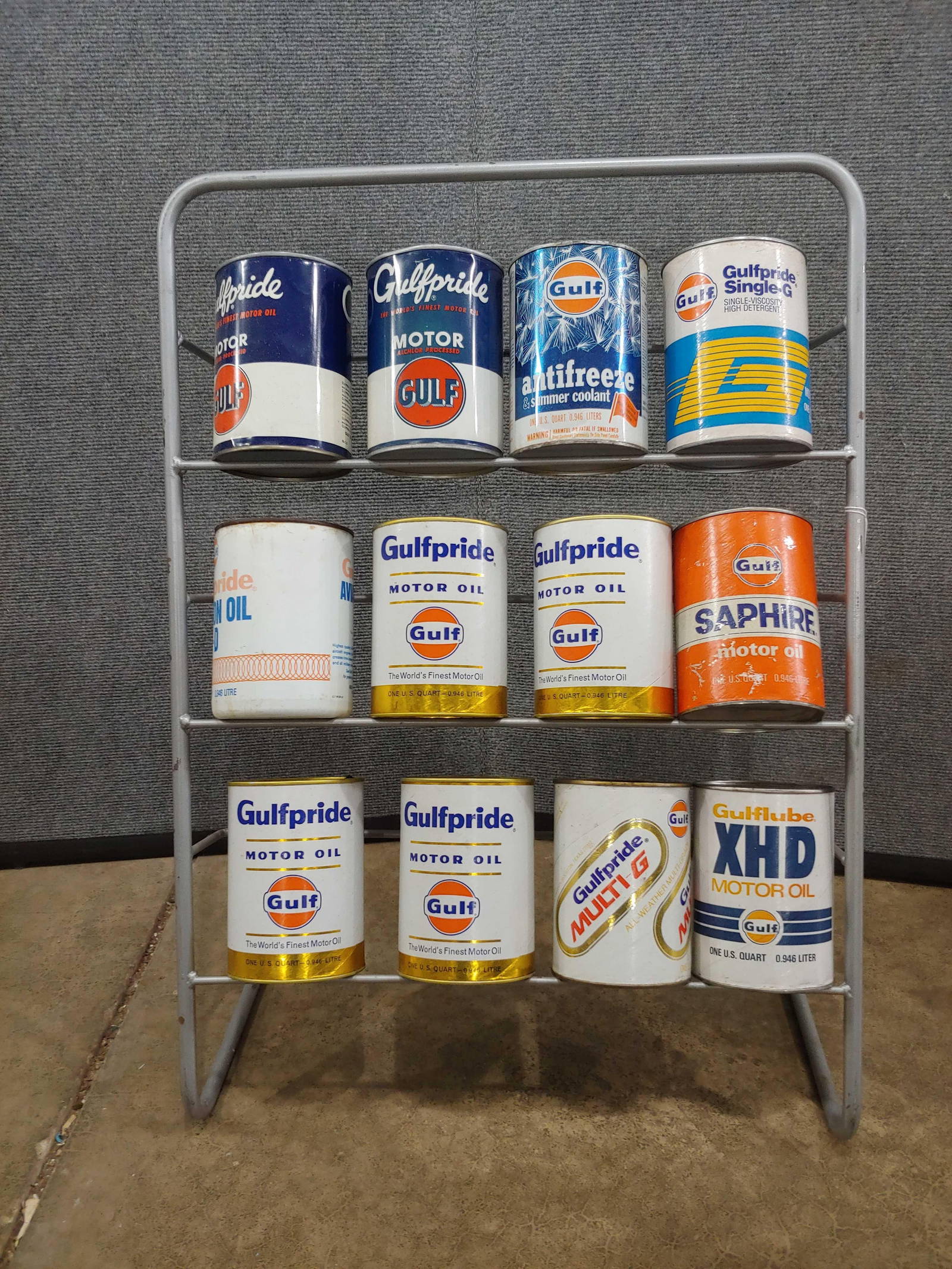 12- Various Gulf Cans With Display Auction
