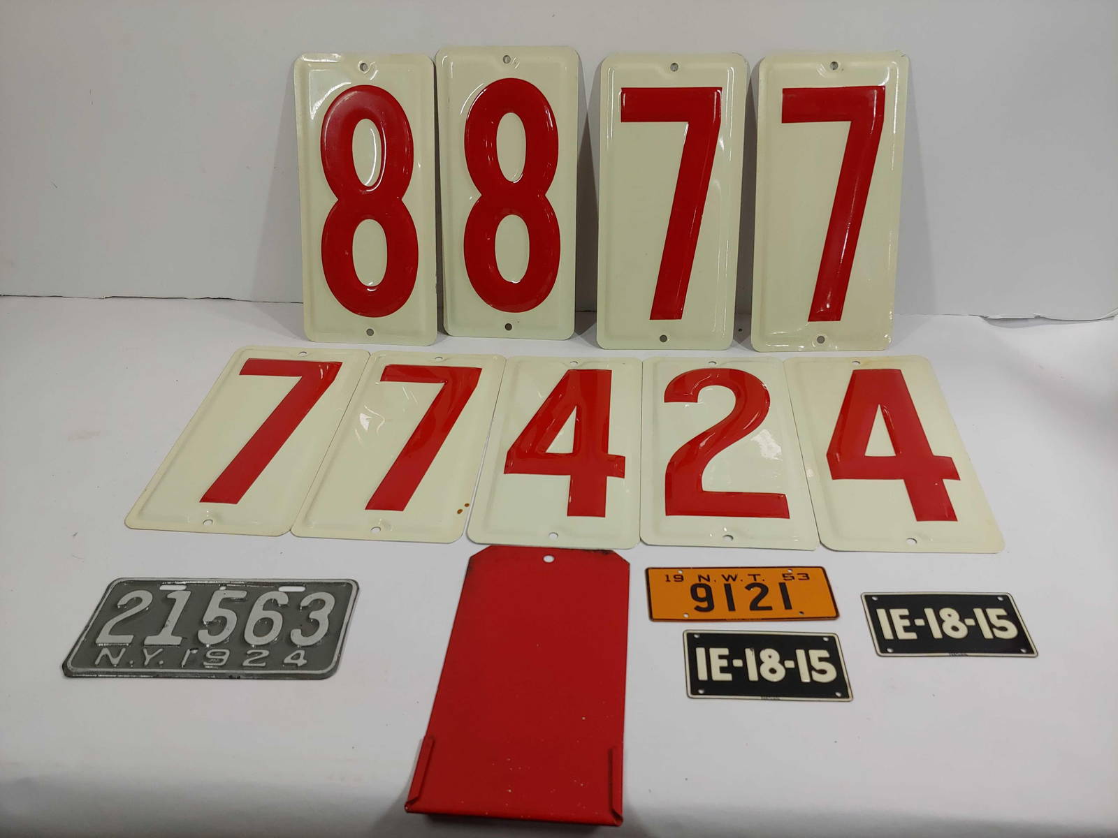 9-nos Station Numbers & License Tags Auction