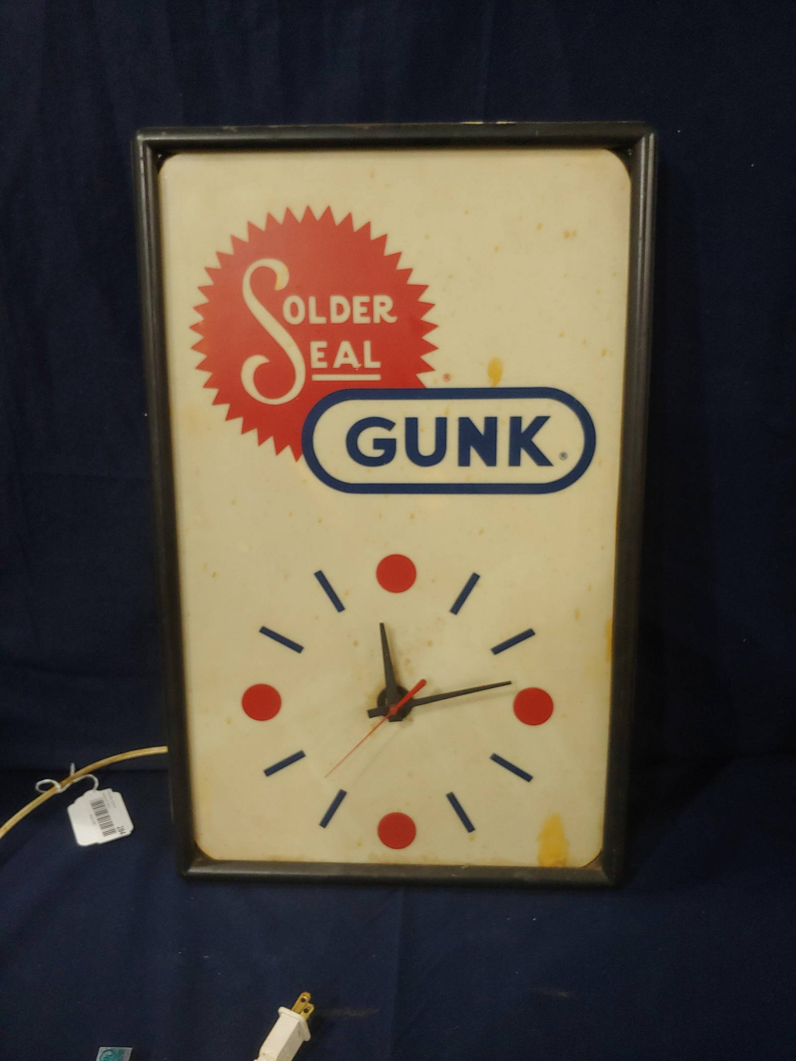 Solder Seal Gunk Advertising Clock Auction