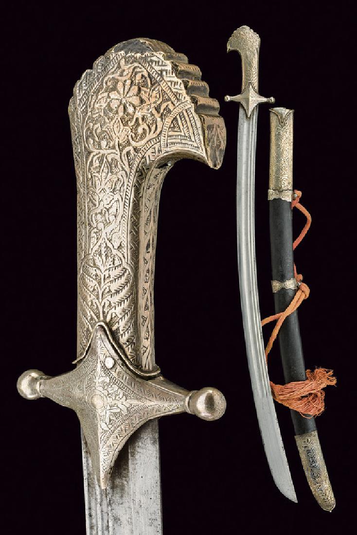 Ornately engraved dallah (Arabic Coffee Pot). Oman.