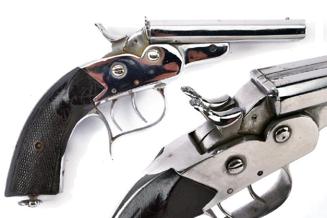 A rolling block double barrelled center fire pistol