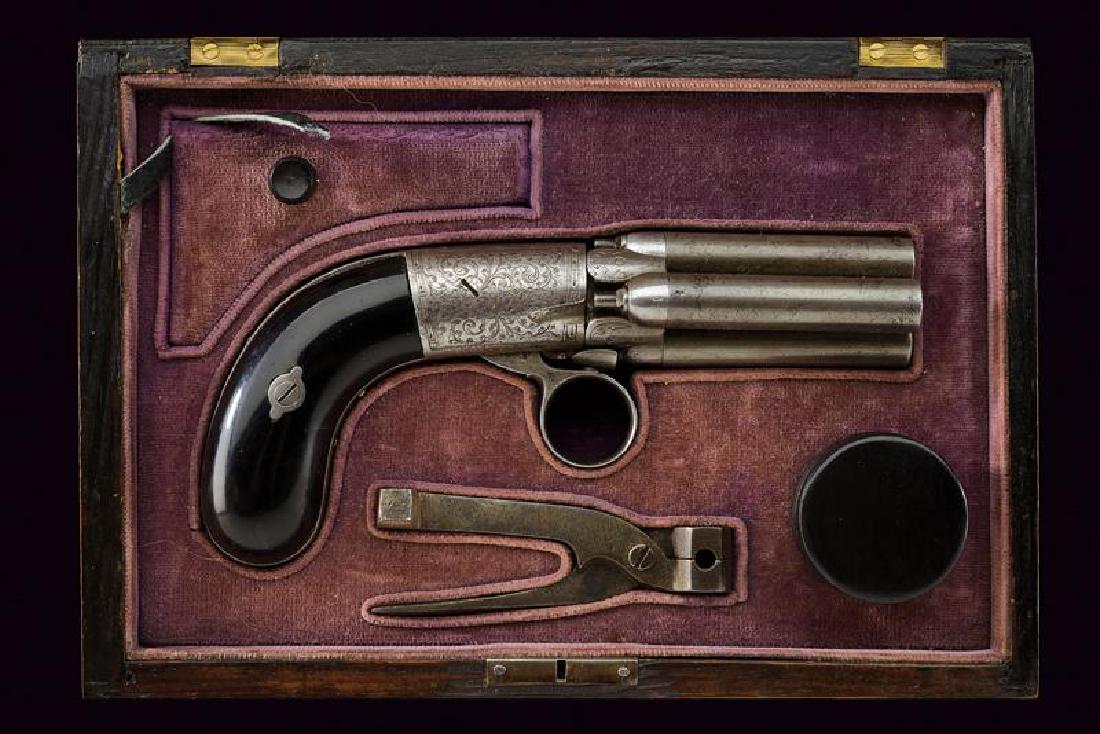 A cased pepperbox percussion revolver